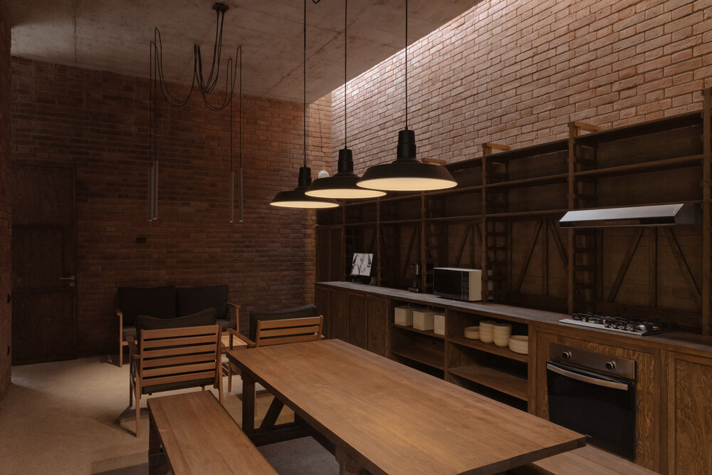 rustic horse stable by módica ledezma blends into its lush mexican setting