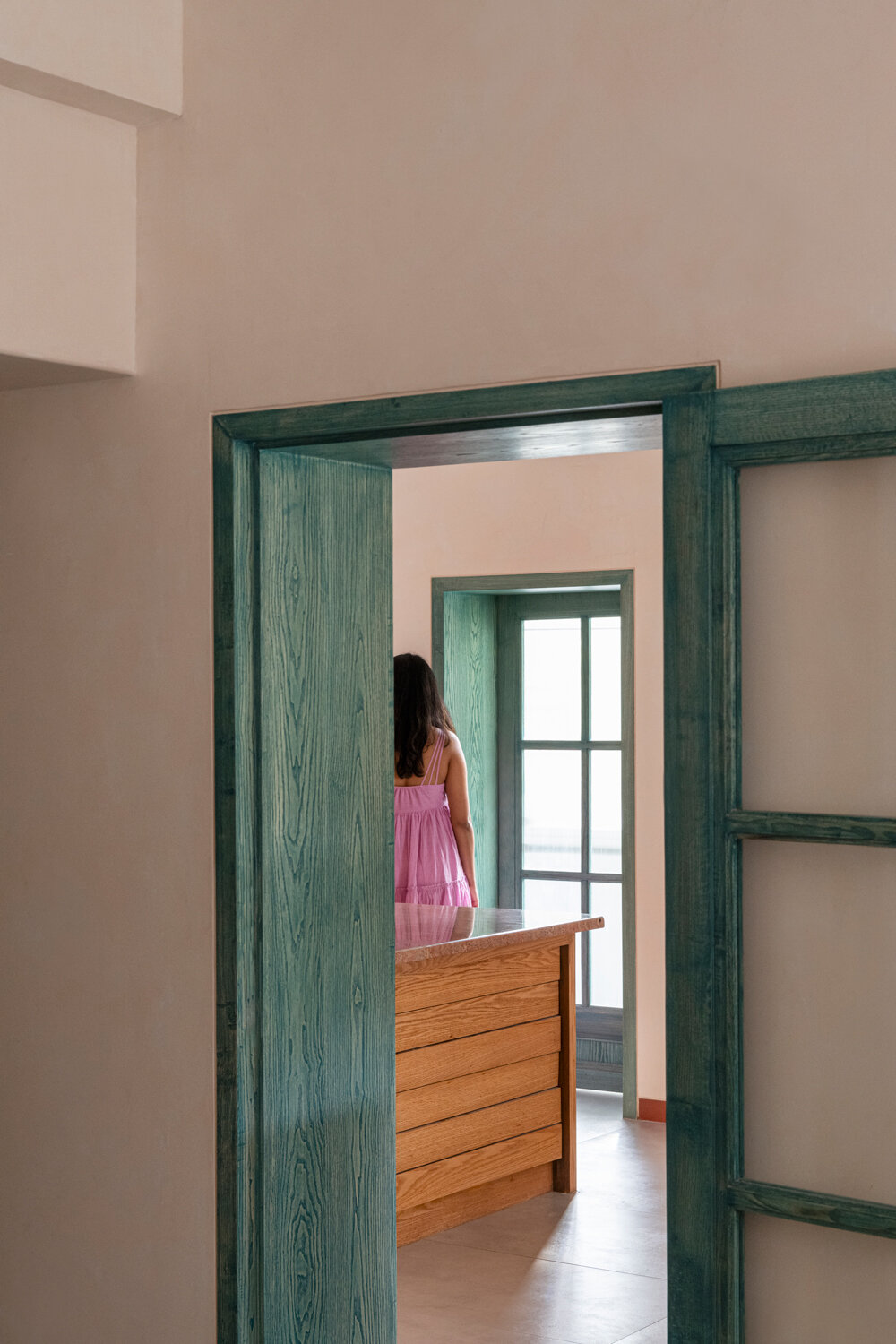 mediterranean hues flow into renovated artist studio space in india