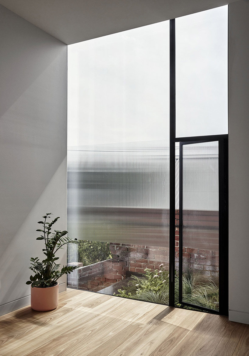 living large in a small block: lang house by austin maynard architects