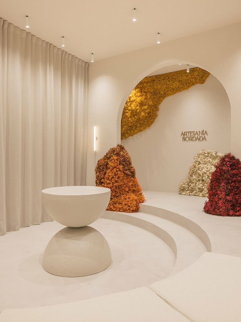 clap studio's floral installation at spain showroom welcomes spring