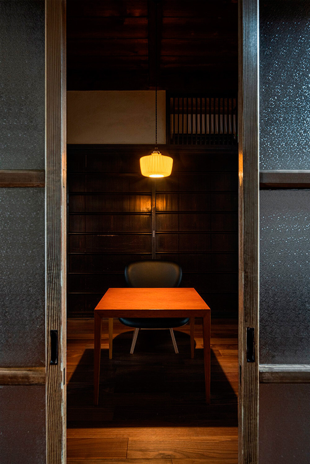 former textile workshop transforms into modern machiya residence in kyoto