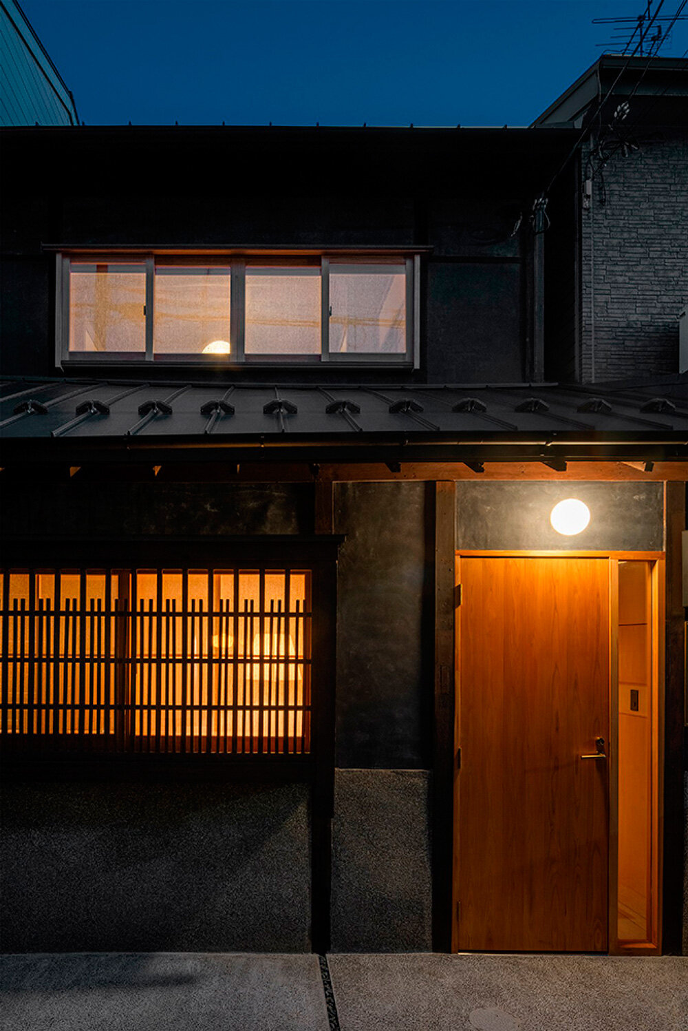 former textile workshop transforms into modern machiya residence in kyoto