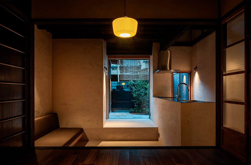 former textile workshop transforms into modern machiya residence in kyoto