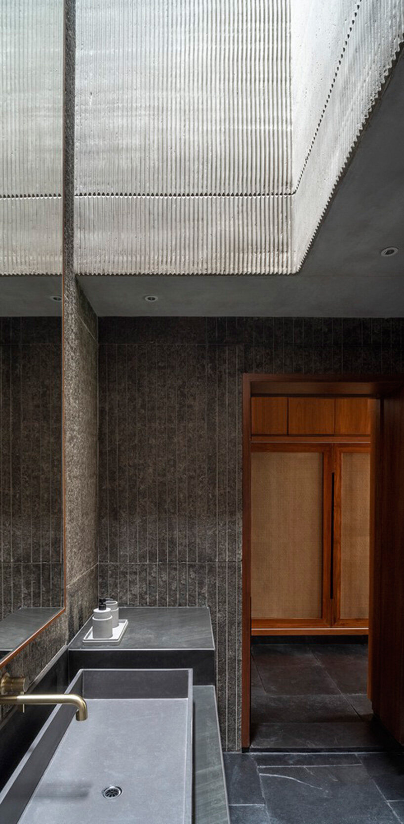 patterned brickwork enfolds residence by purple ink studio in india