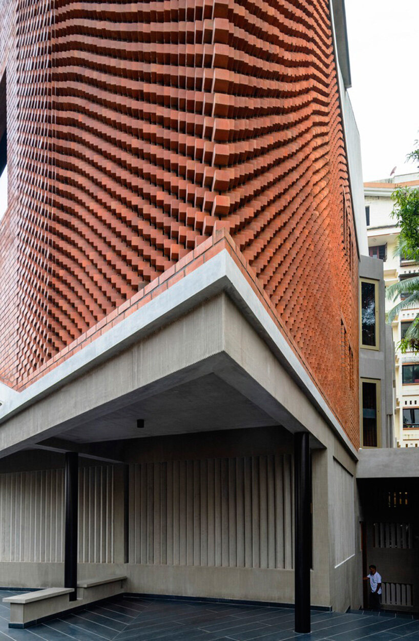 patterned brickwork enfolds residence by purple ink studio in india