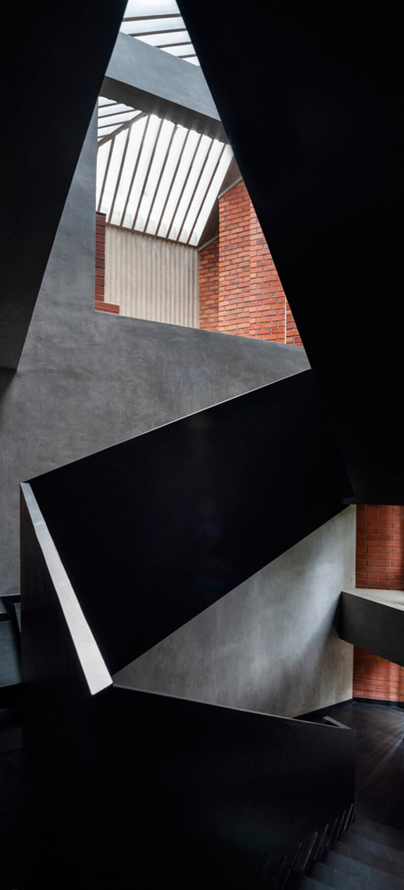 patterned brickwork enfolds residence by purple ink studio in india