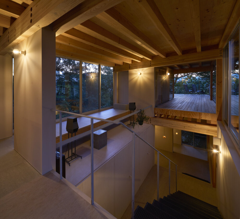 OHArchitecture embeds stepped camma villa and office onto sloping site ...