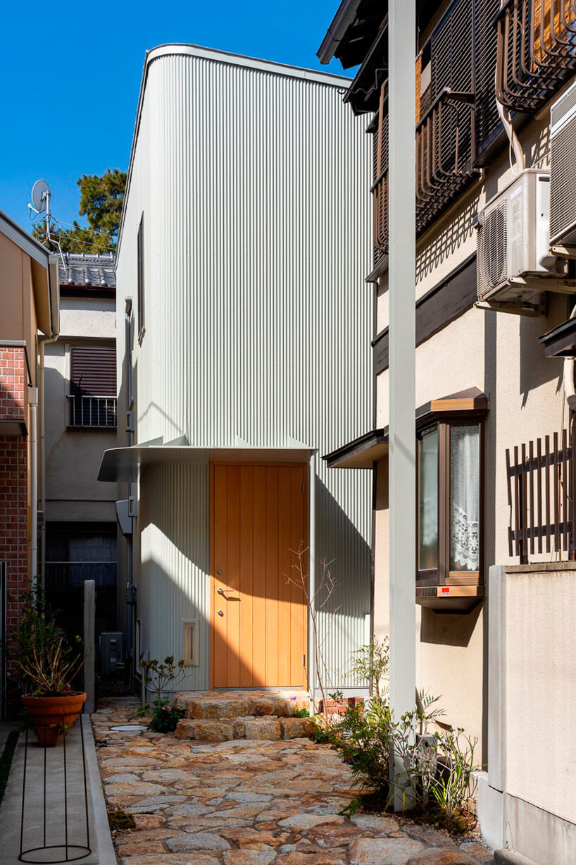 house in shukugawa by arbol design unfolds around zenithal dome skylight
