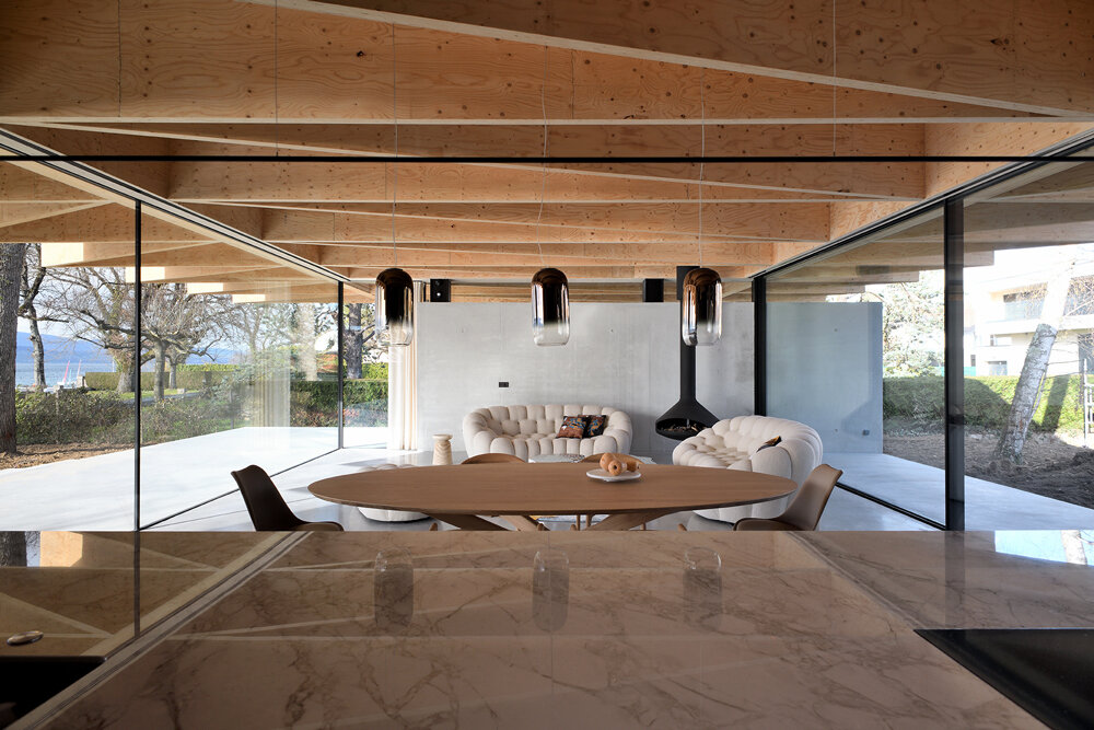 jagged wooden structure unfolds on top of ba holz house sitting along ...