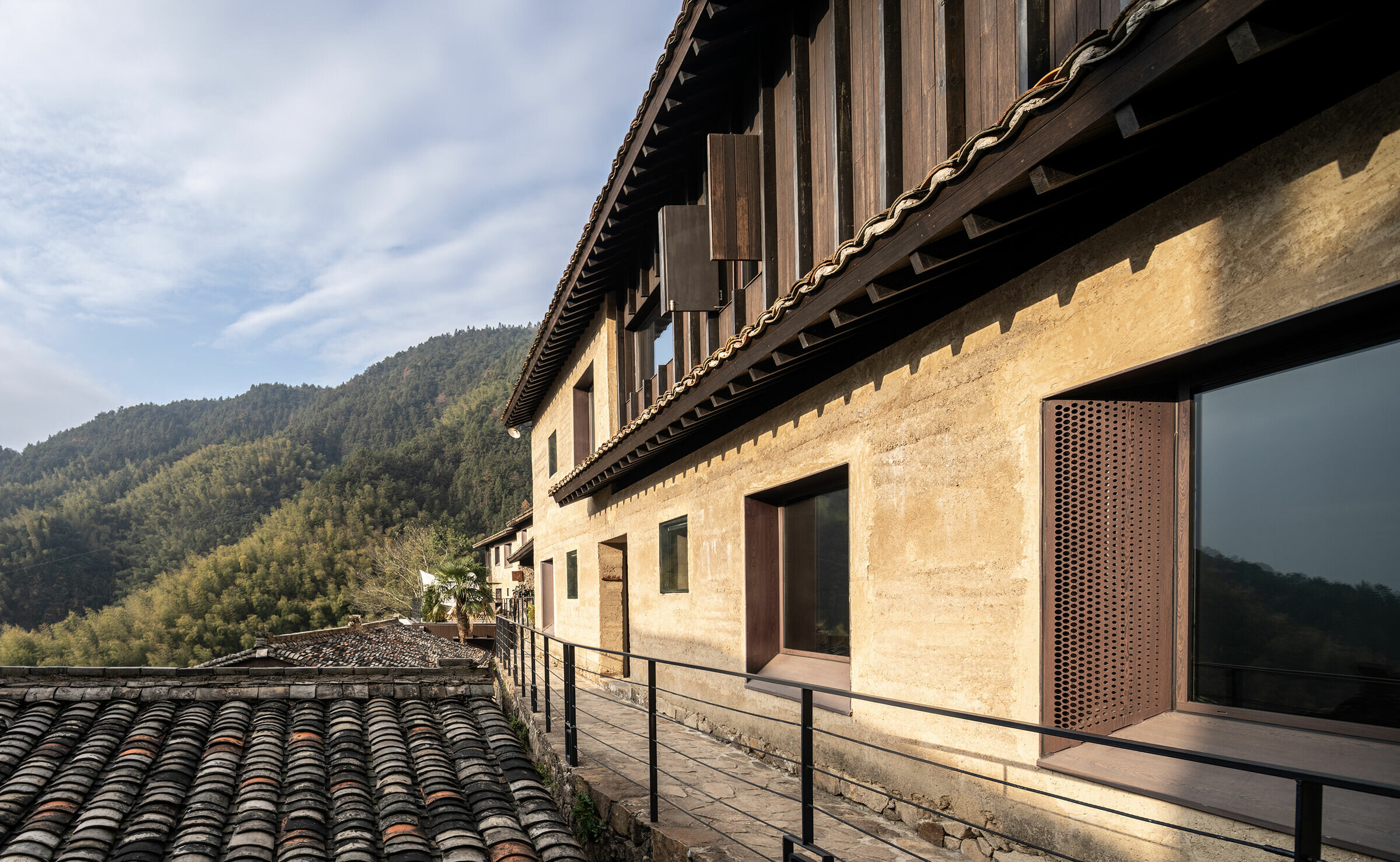 line+ revives cliffside ancient rammed-earth village in china introducing songyang art hotel