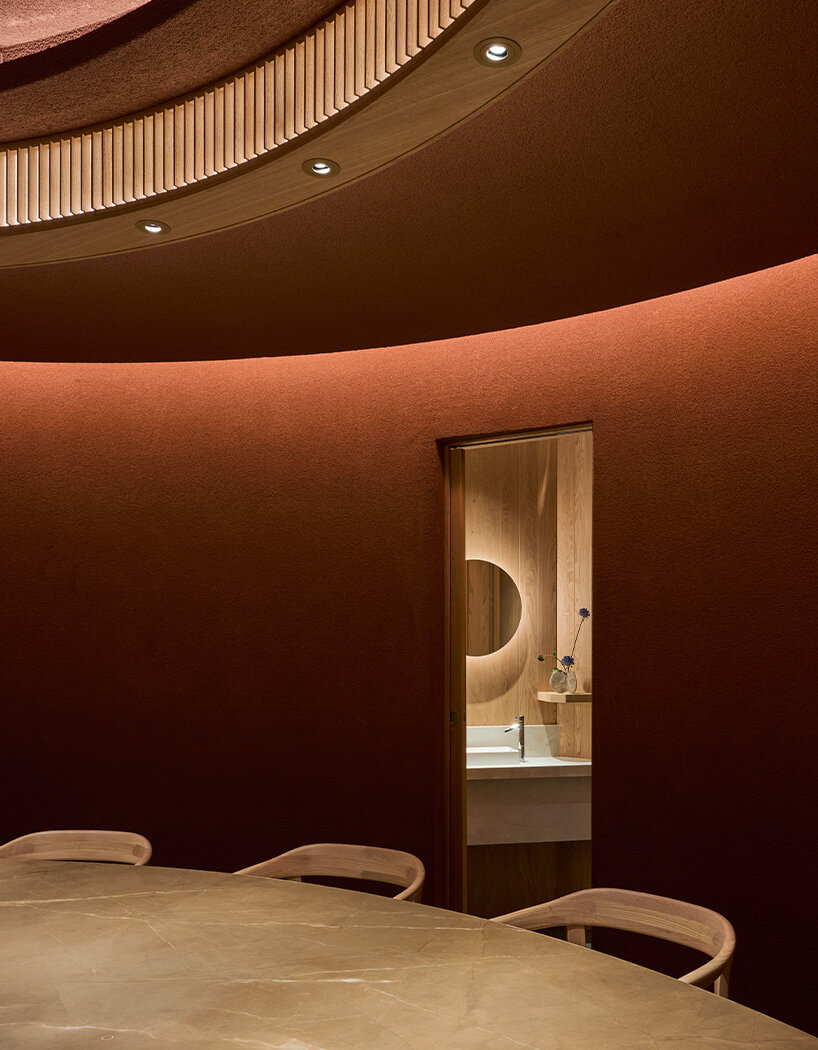naoya matsumoto imbues earthy tones into isai restaurant in osaka