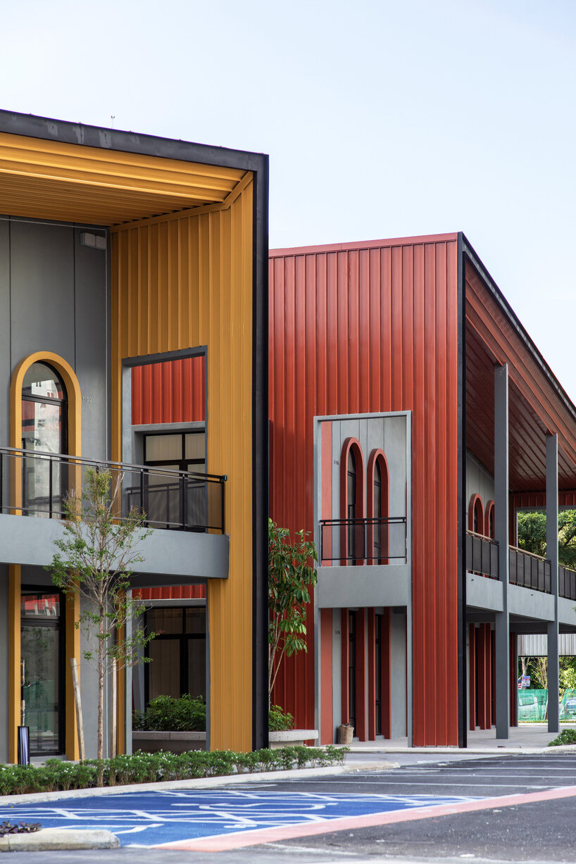 colorful roofed units compose TKCA architect's sama square market ...