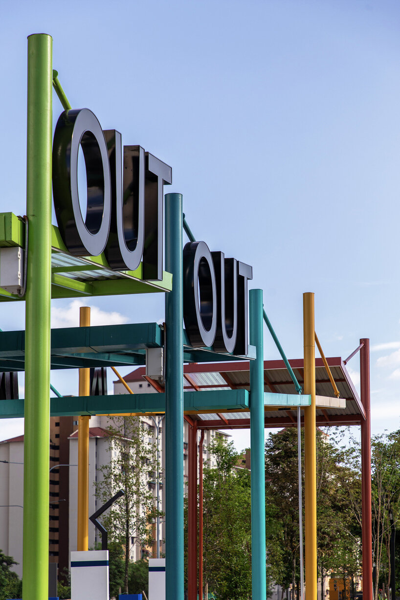 colorful roofed units compose TKCA architect's sama square market ...