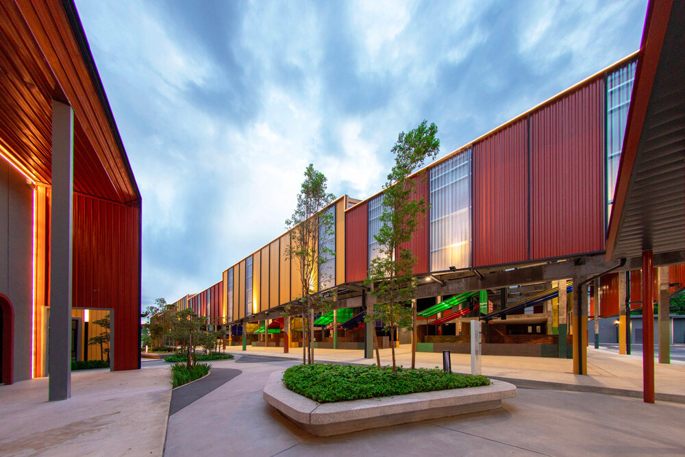 colorful roofed units compose TKCA architect's sama square market ...