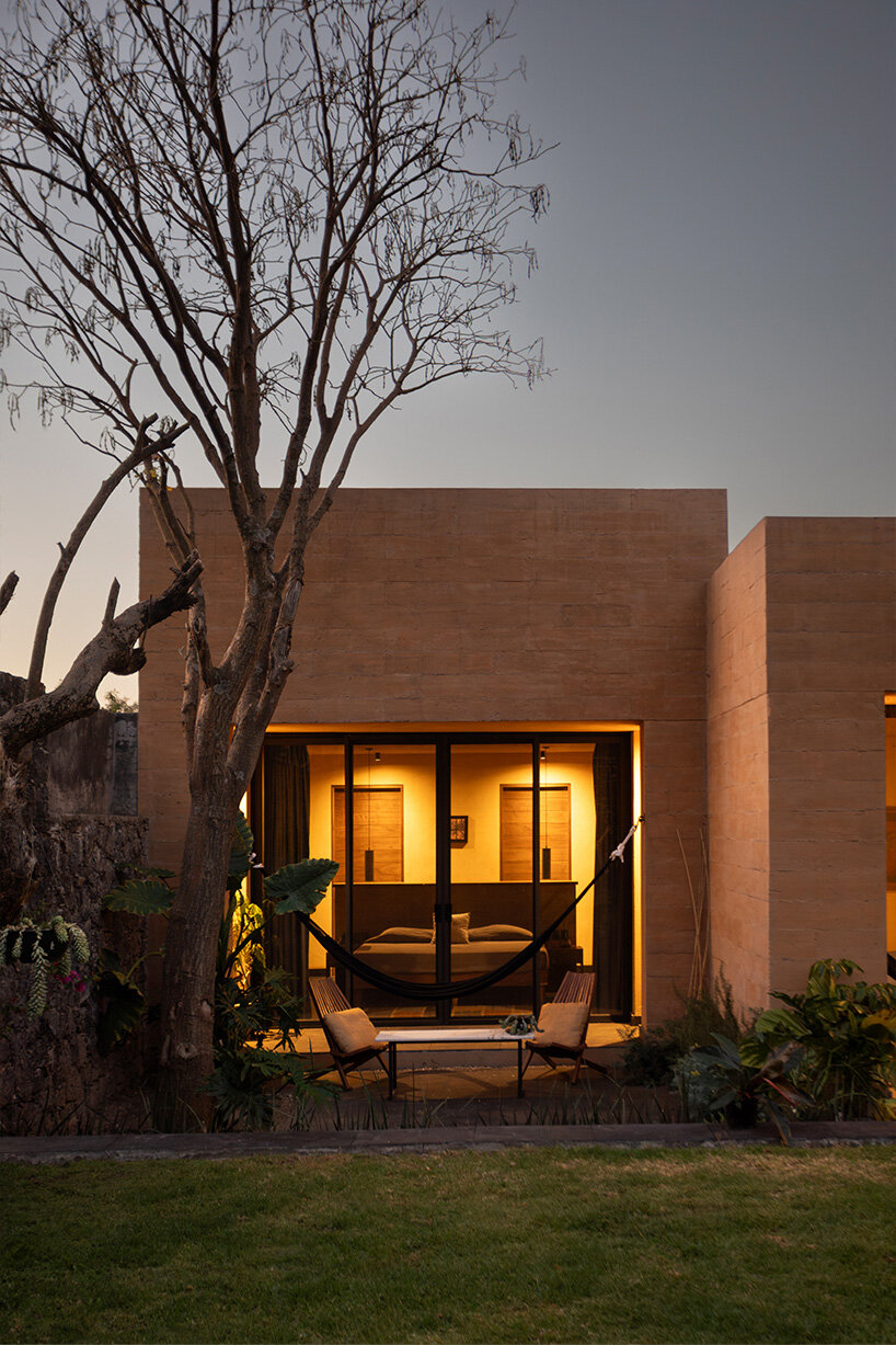 RA! sculpts monolithic house emerging from rocky cliffs in mexico