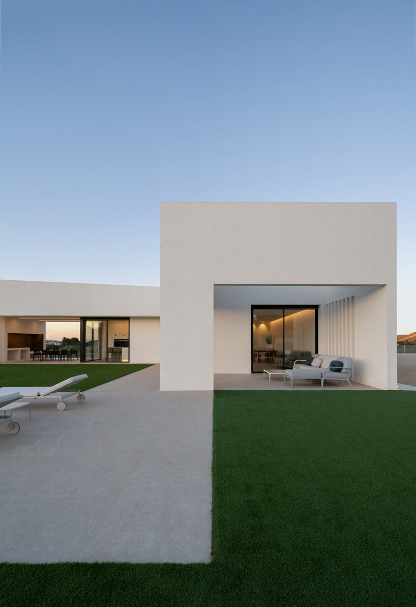 four solid white blocks outline wind house by ruben muedra arquitectura ...