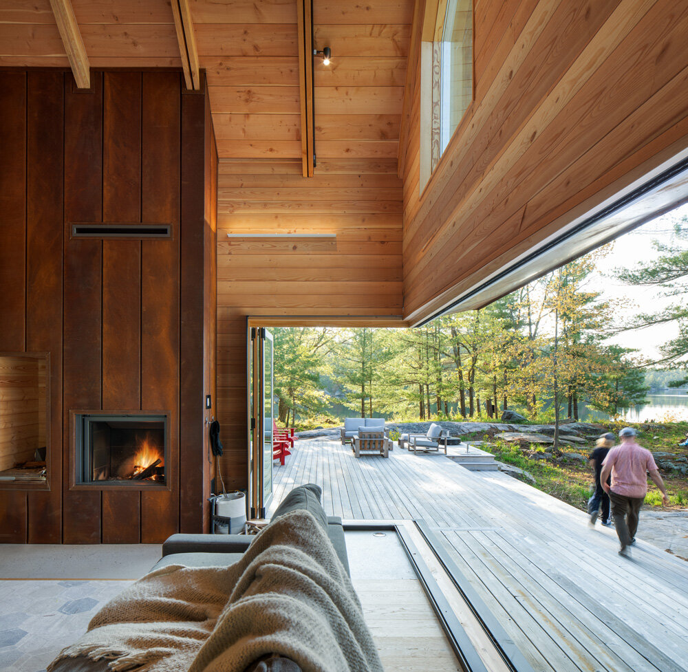 undulating shoreline envelops six mile lake cottage by BLDG workshop