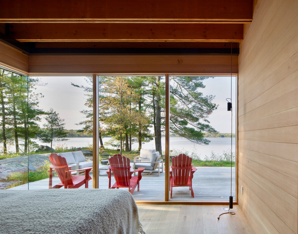 undulating shoreline envelops six mile lake cottage by BLDG workshop