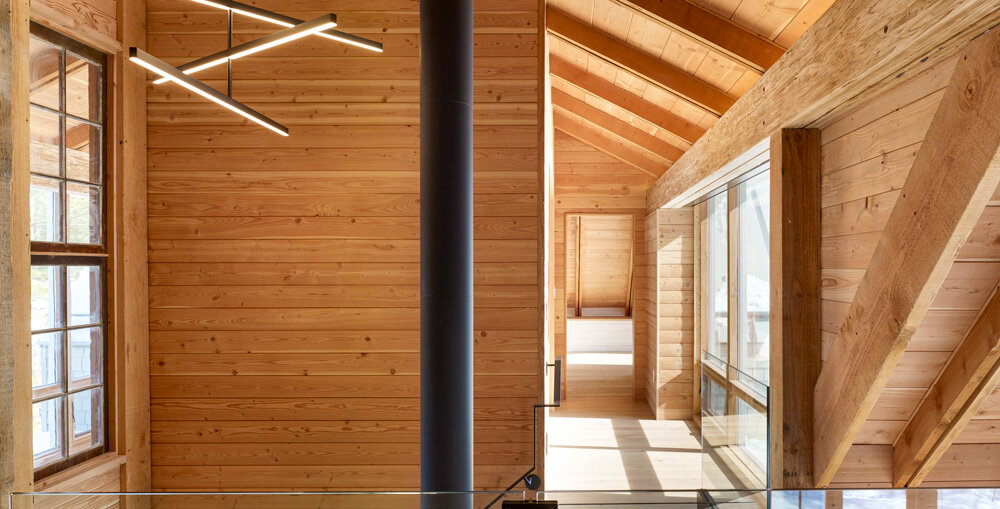 undulating shoreline envelops six mile lake cottage by BLDG workshop