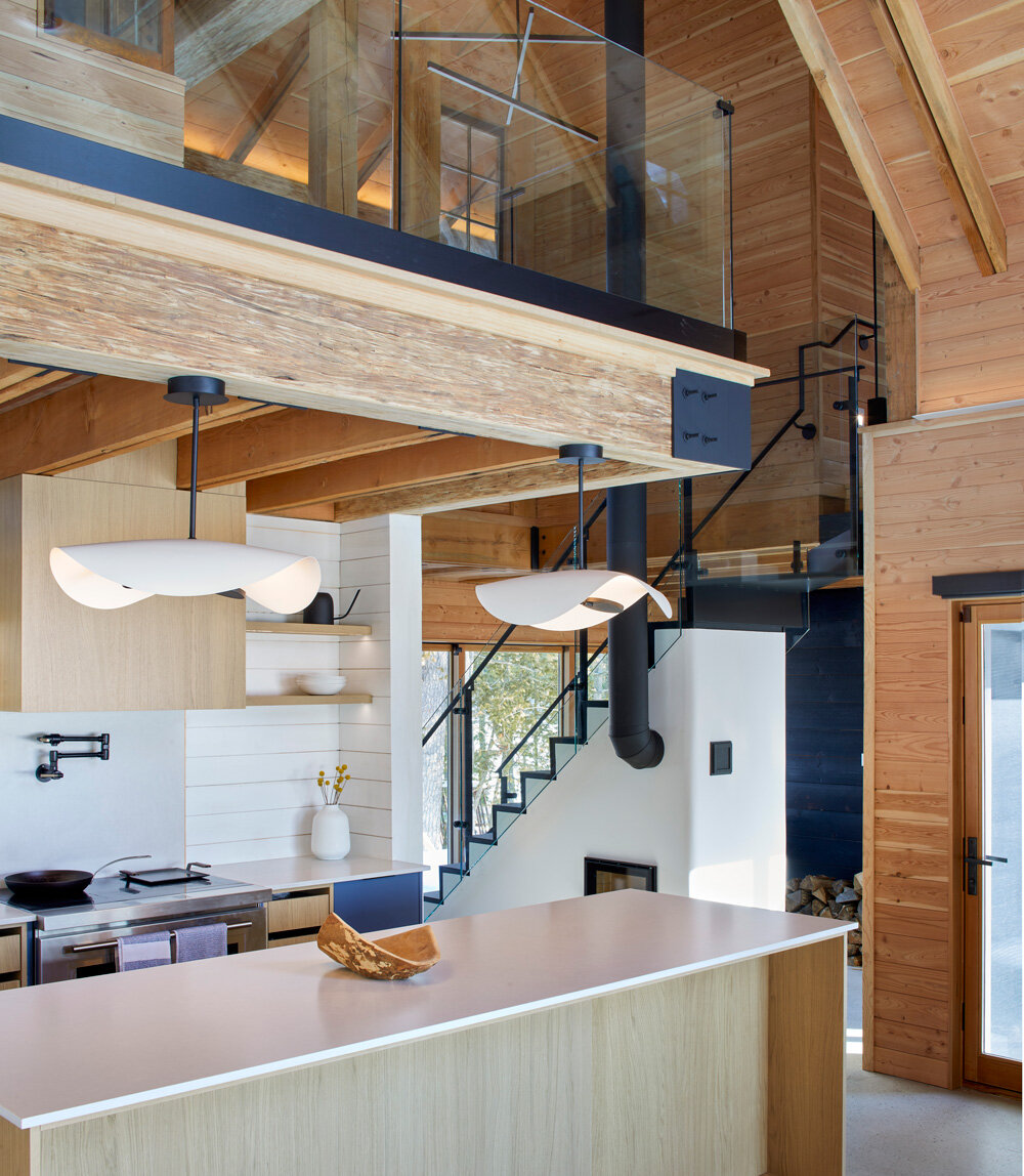 undulating shoreline envelops six mile lake cottage by BLDG workshop