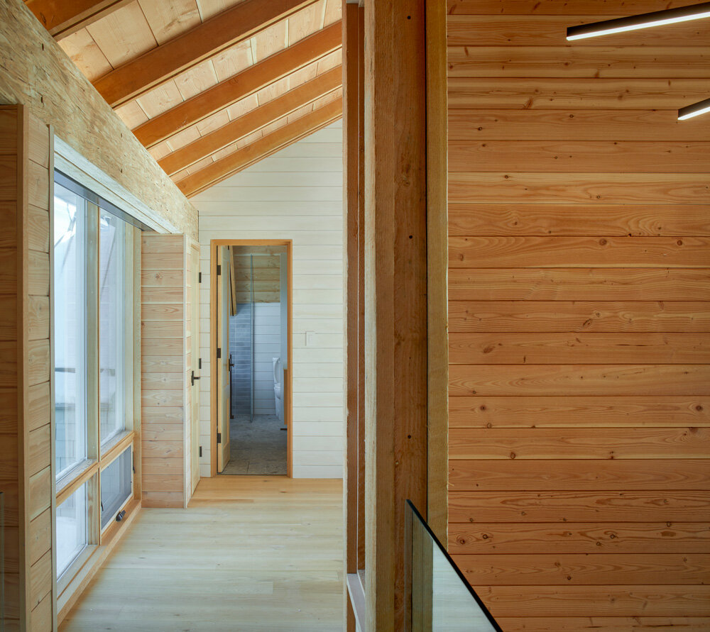 undulating shoreline envelops six mile lake cottage by BLDG workshop