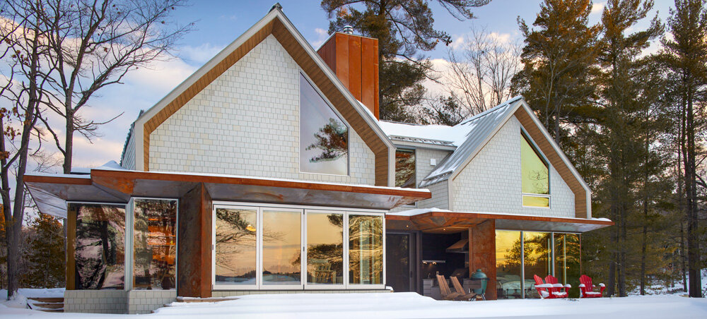 undulating shoreline envelops six mile lake cottage by BLDG workshop