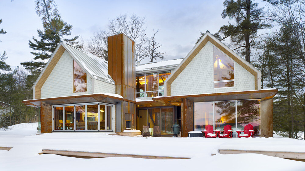 undulating shoreline envelops six mile lake cottage by BLDG workshop