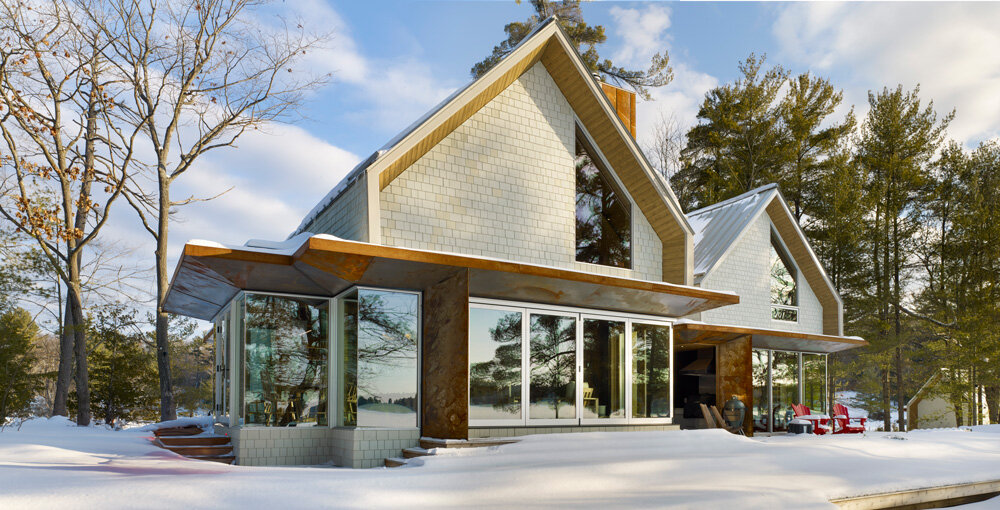 undulating shoreline envelops six mile lake cottage by BLDG workshop