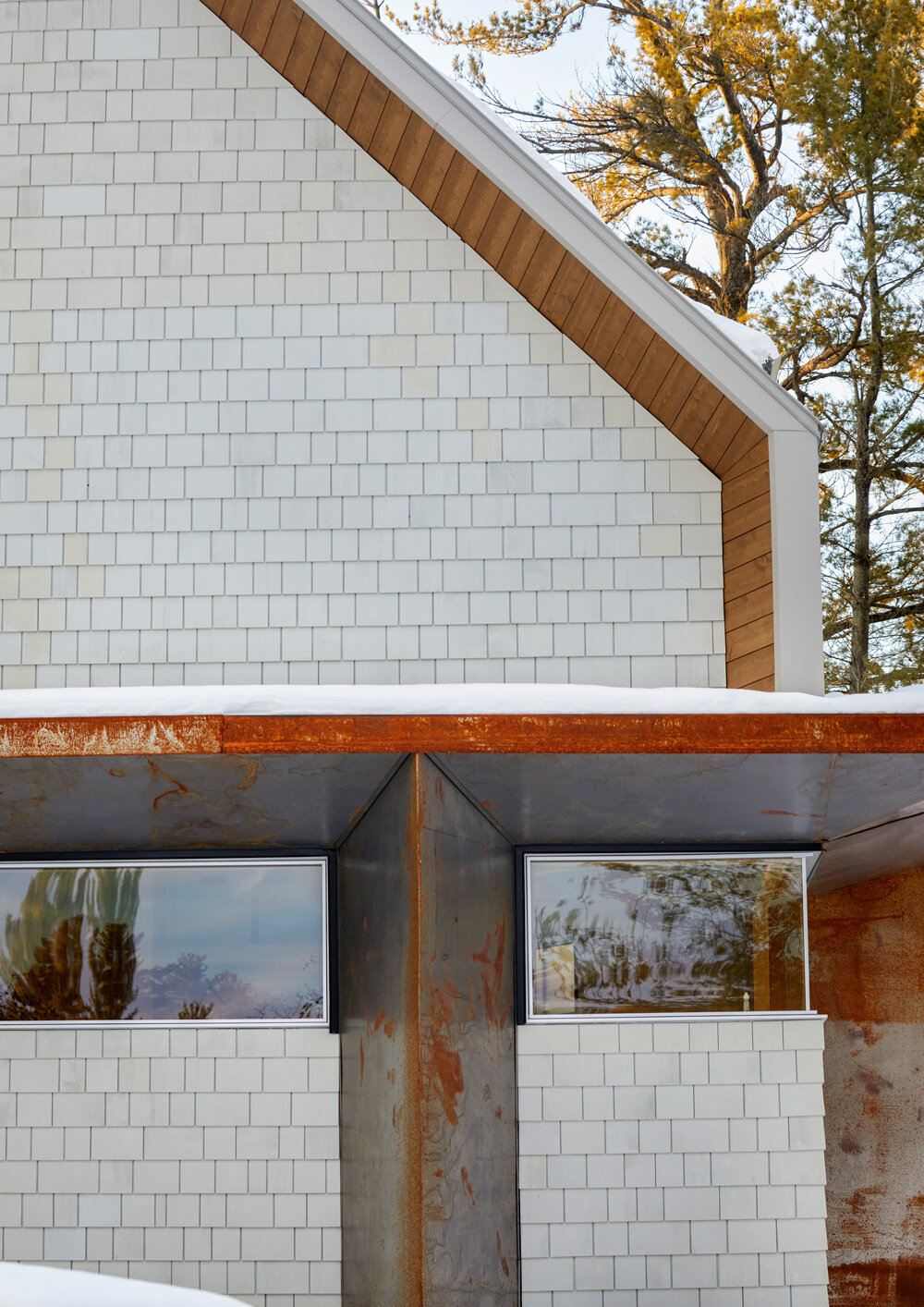 undulating shoreline envelops six mile lake cottage by BLDG workshop