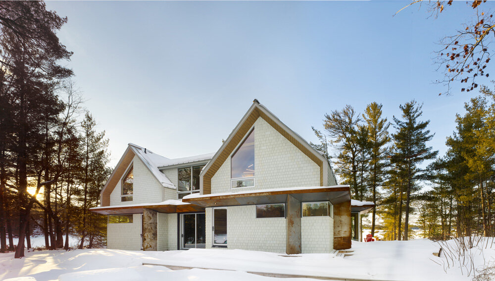 undulating shoreline envelops six mile lake cottage by BLDG workshop