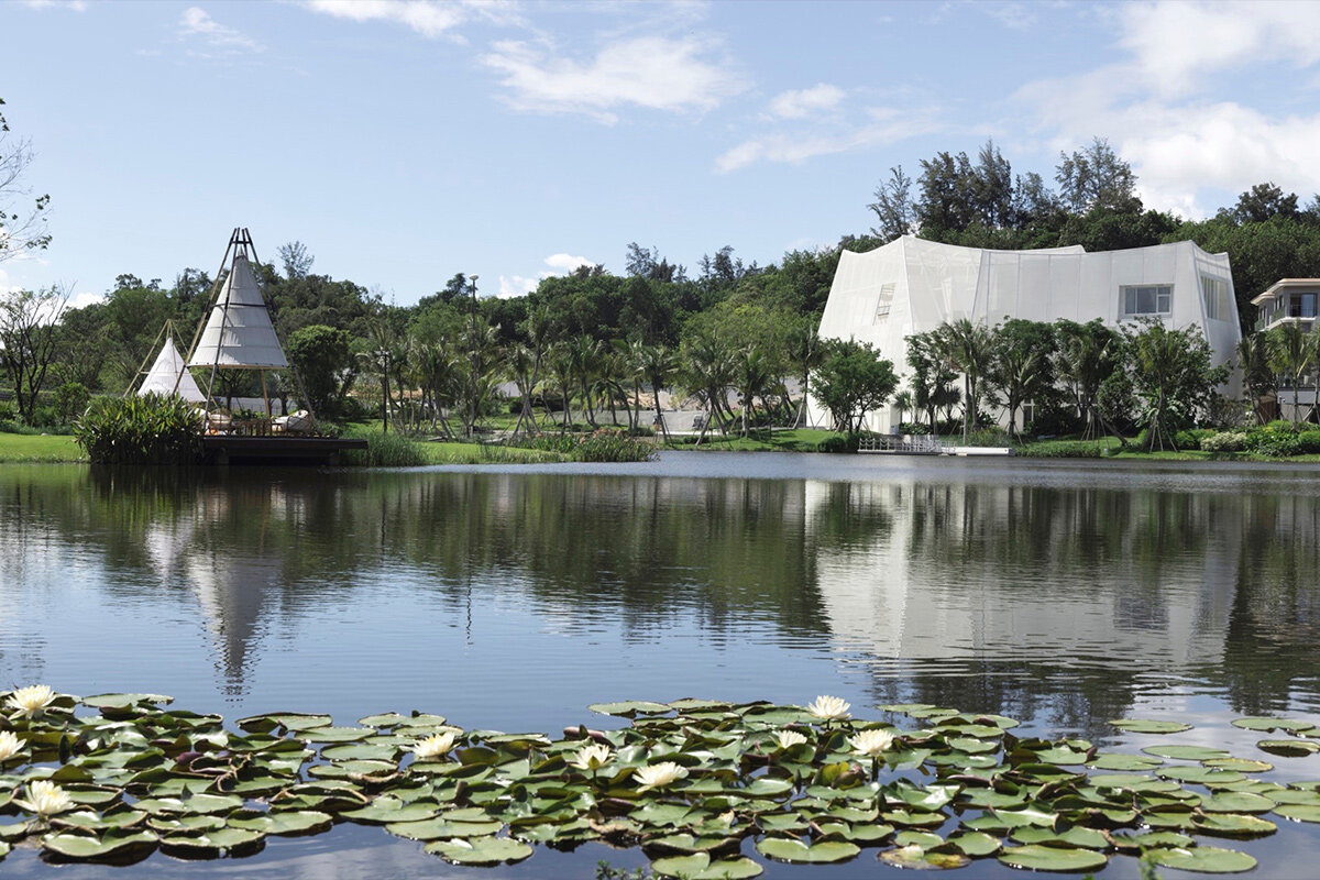 wutopia lab's flickering peak gallery is a trio of luminous 'mountains'