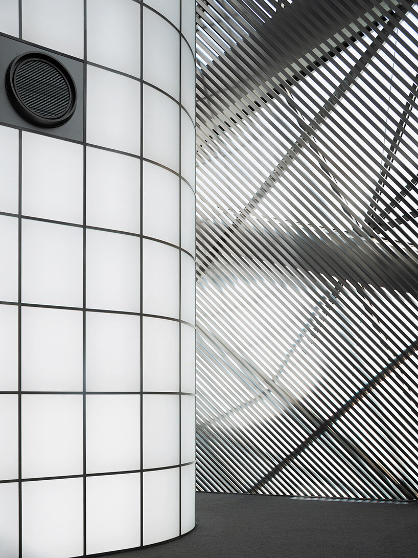 faceted glass curtain walls flood DJI's shenzhen origami-like flagship ...