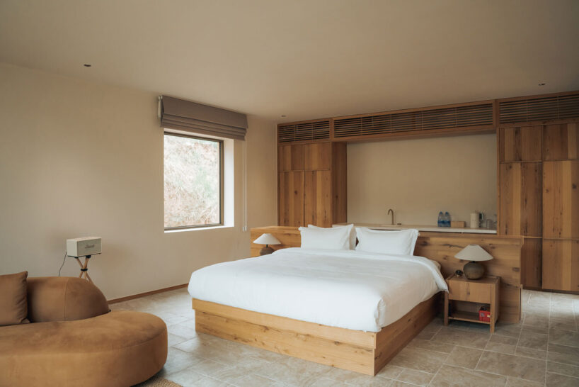 geometric house sculptures emerge from earth for CPLUS' village renewal project in china