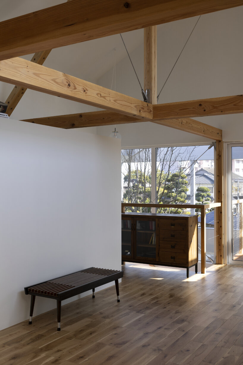 silver panels mirror japanese cityscape on goya schröder’s wooden ...