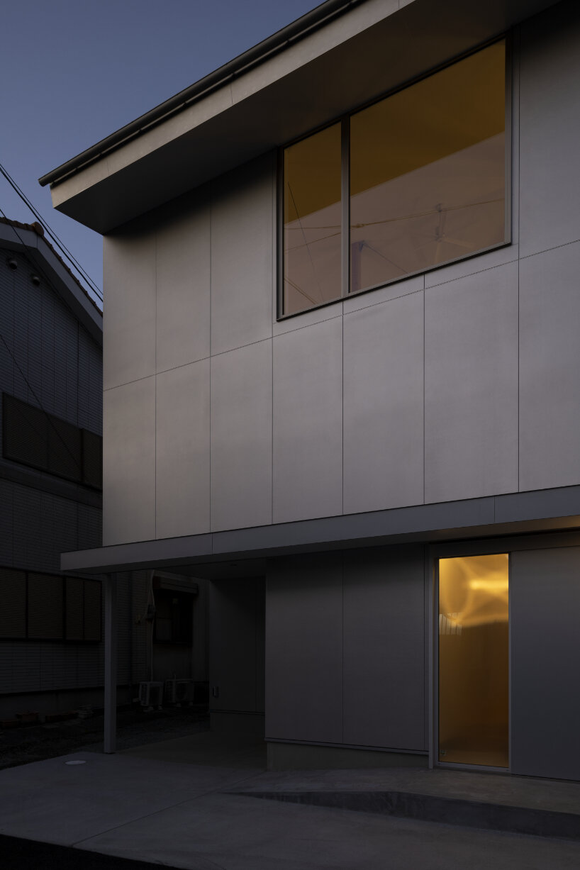 silver panels mirror japanese cityscape on goya schröder’s wooden ...