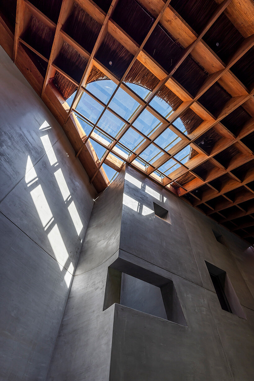 timber waffle roof shields constellation of living spaces in vietnamese ...