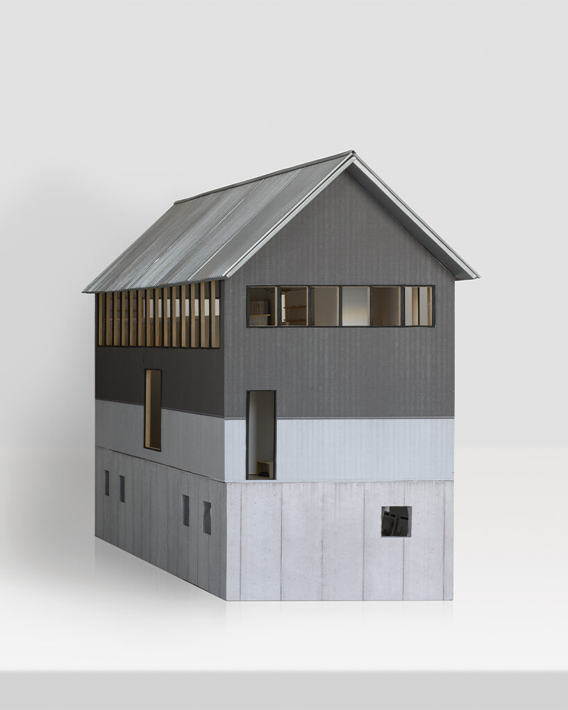 clad in grey wood, ardmore house by kwong von glinow stands in chicago