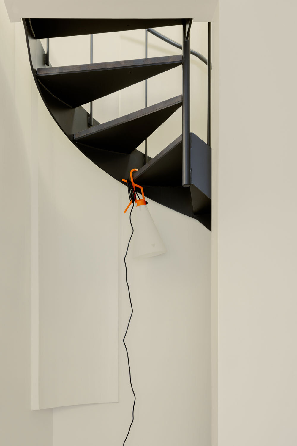 rotated wall shapes triangular voids within wooden house in tokyo