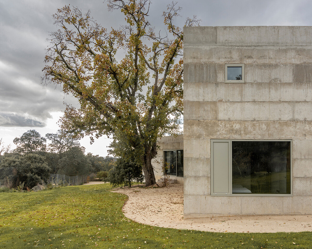 durable castilian fortresses inspire this 'house X' by bojaus arquitectura