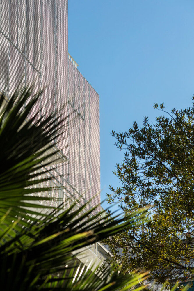 arid layers lightweight volumes atop 1950s building in athens